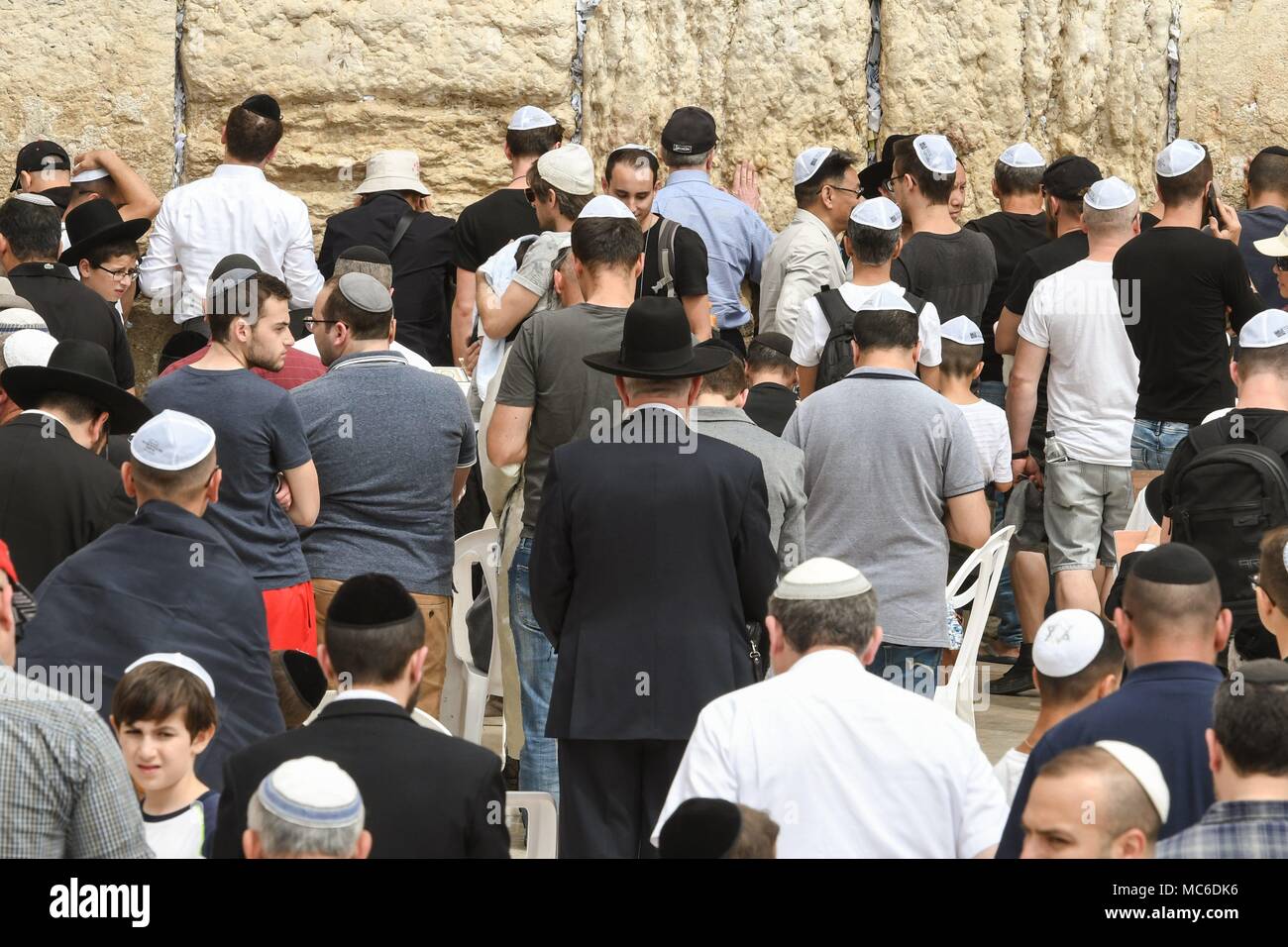 Jews gathering and praying at the Western Wall inside the Old City in ...