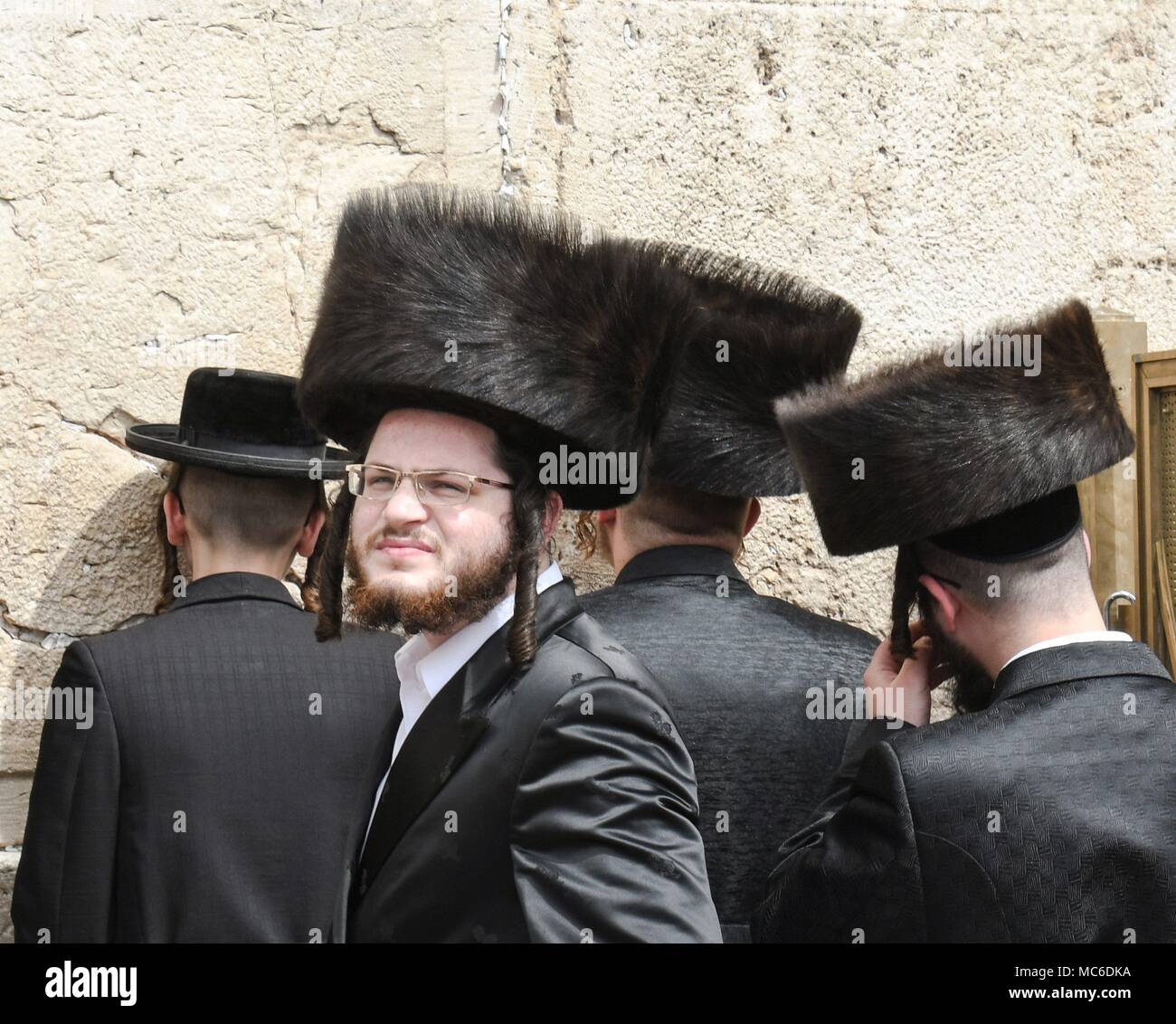 Jews gathering and praying at the Western Wall inside the Old City in ...