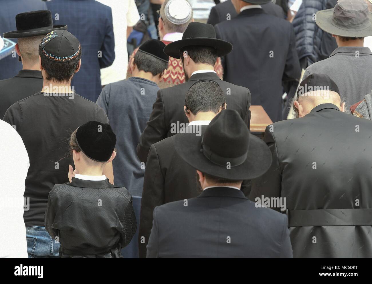 Jews gathering and praying at the Western Wall inside the Old City in ...