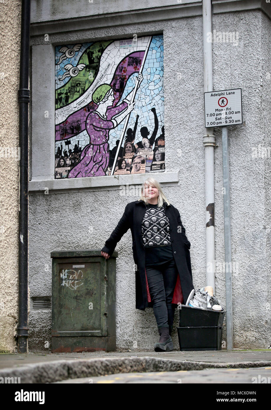 Artist Carrie Reichardt alongside her ceramic mosaic Suffragette Spirit ...