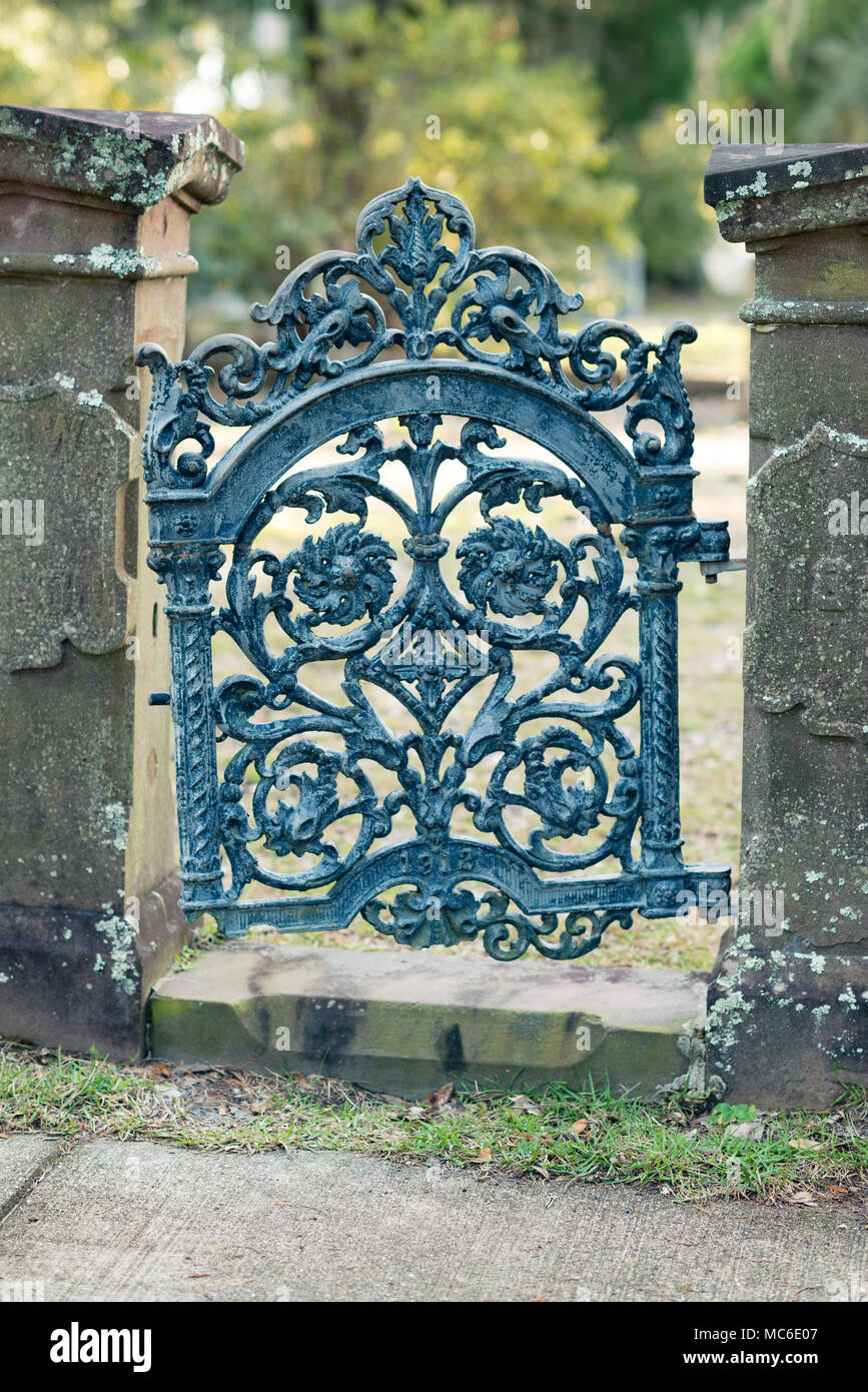 Old and weathered small wrought iron gate entrance to area Stock Photo ...