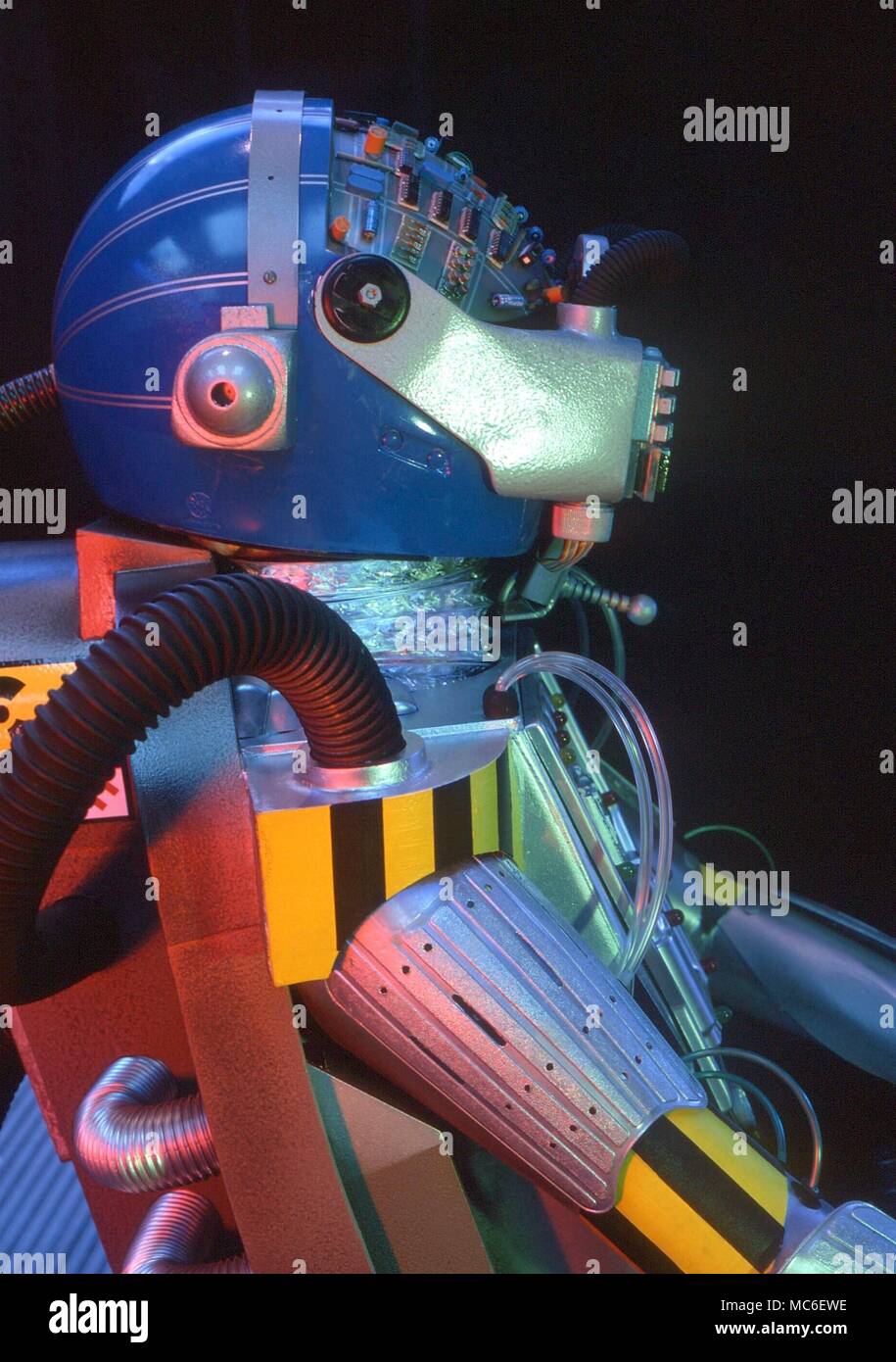 AUTOMATA Robot (the size of an adult human) at the controls of a space ...
