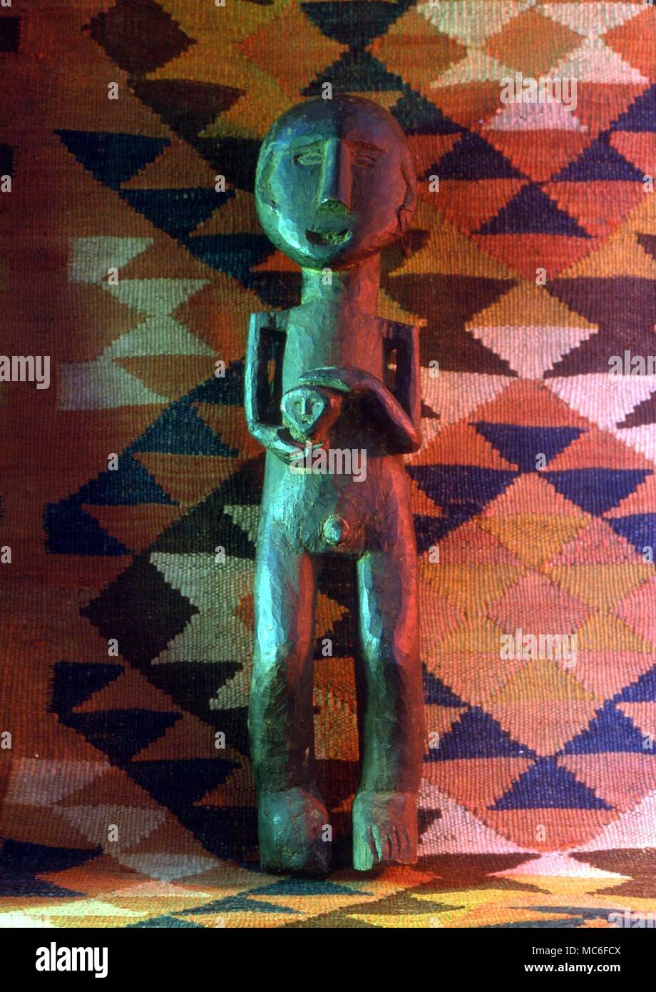 HEAD HUNTERS Hardwood statue of Headhunter with trophy head. Naga tribe ...