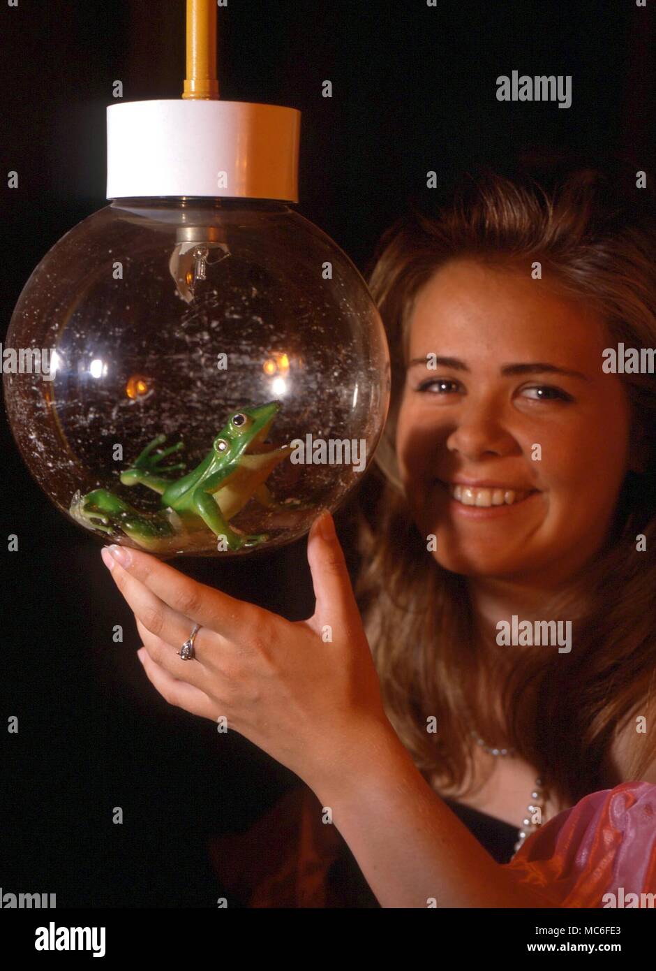 STAGE MAGIC - Shooting the frog. Magician shoots at a light bulb. In ...