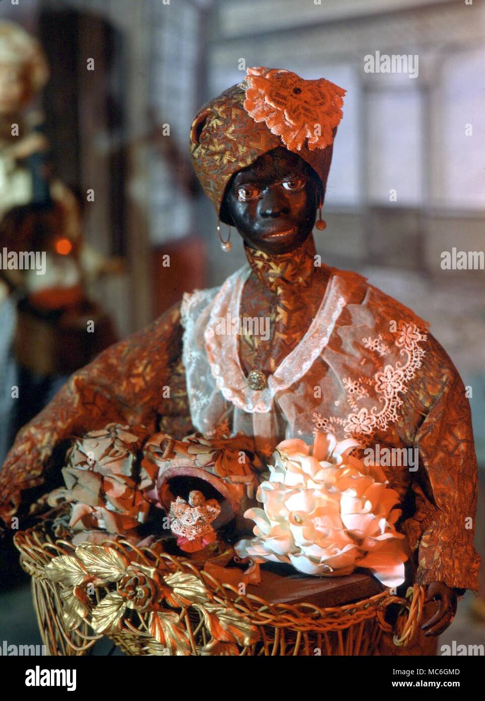 A negro Mamma' automaton, who sells flowers. From the Museum of ...