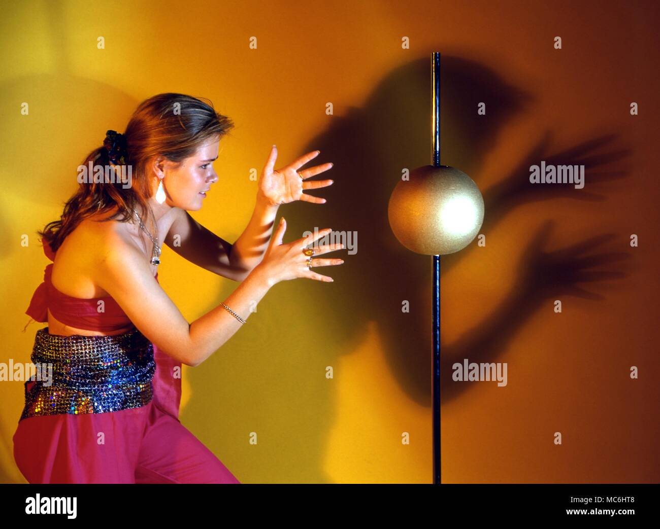 Stage Magic - The Animated Ball. The girl shows that the ball has a ...