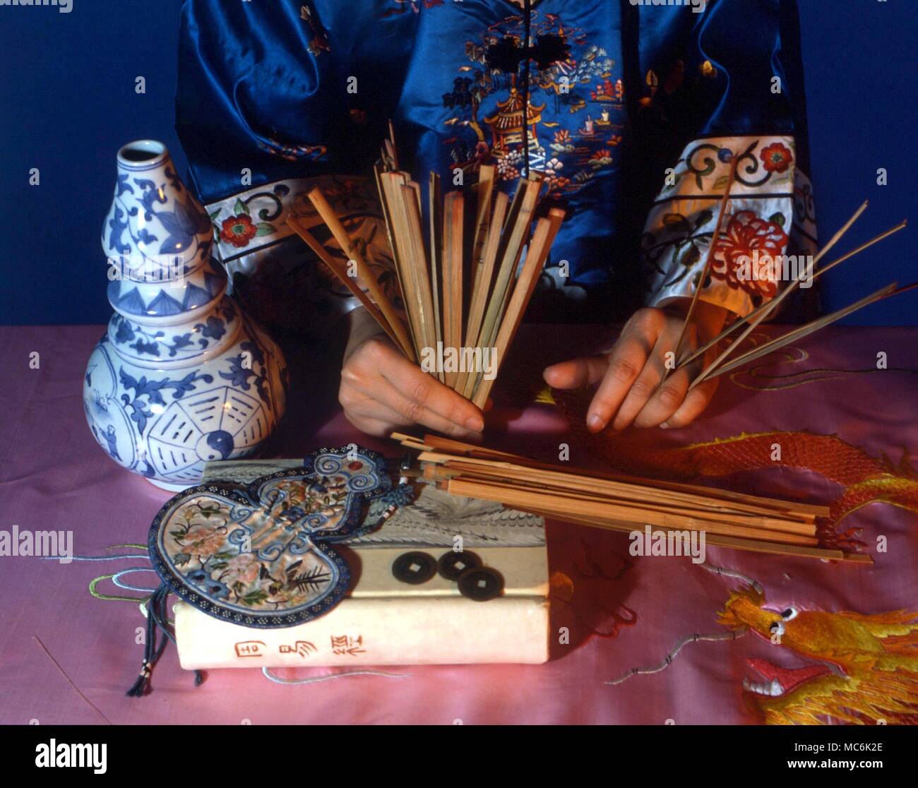 I CHING Material prepared for an I Ching reading, with sticks, coins ...
