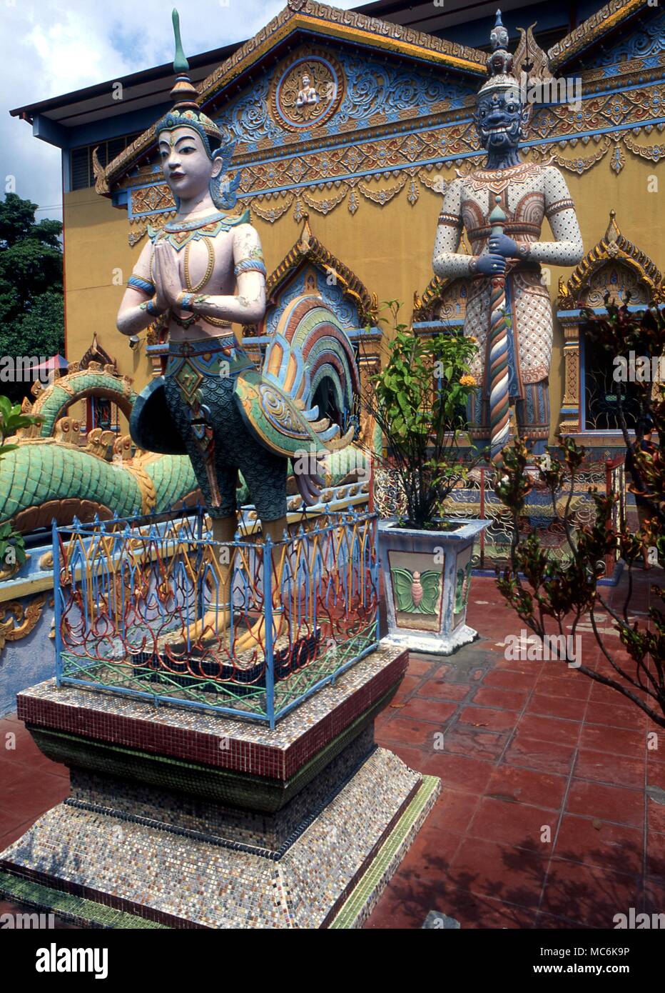 Mythological garuda guardian at the facade of the Wat Chayamanghkalaram ...