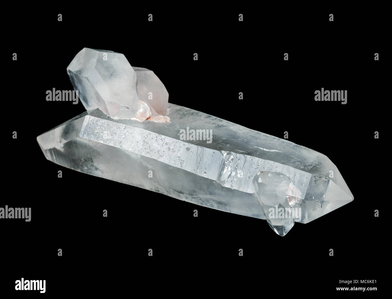 Large transparent two-headed crystal of rock crystal, isolated on a ...