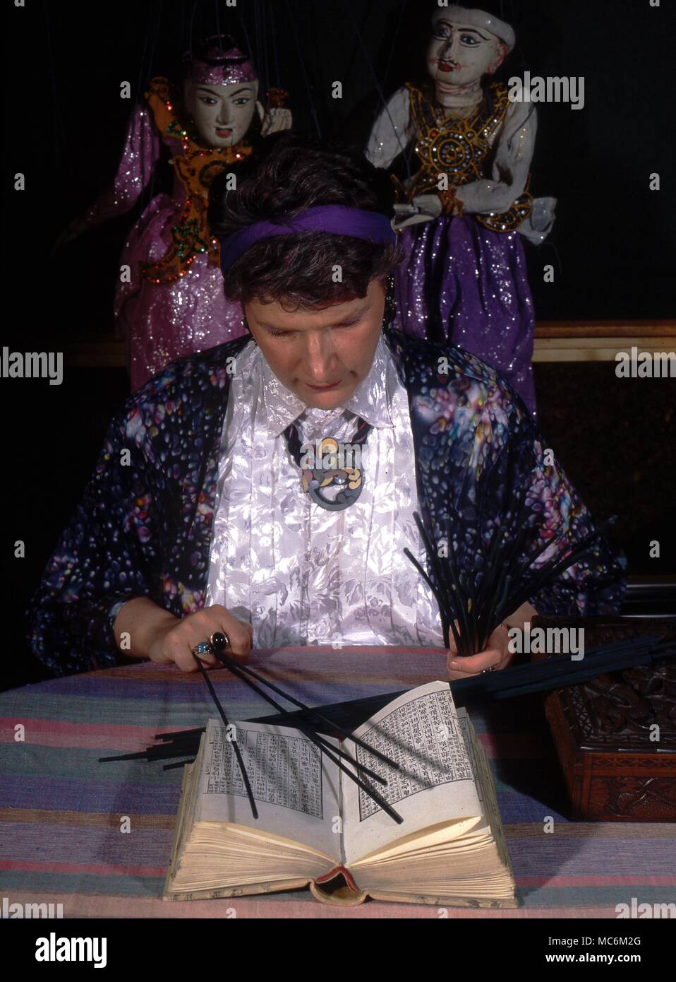 I Ching The clairvoyant Dale Brown using sticks to determine a hexagram ...