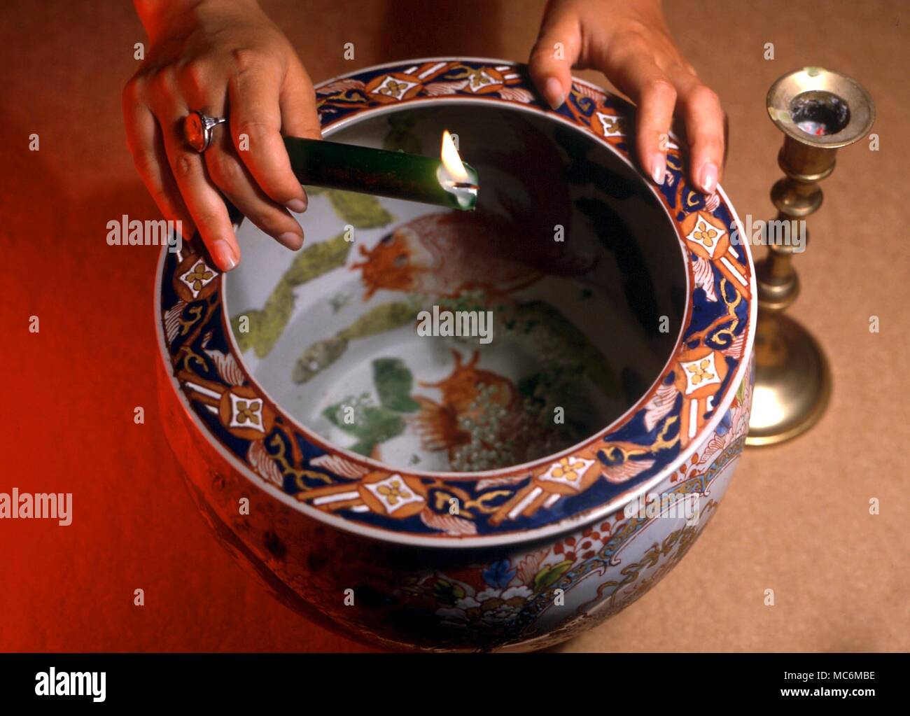 DIVINATION - CEROMANCY. Divination from the random patterns of wax left ...