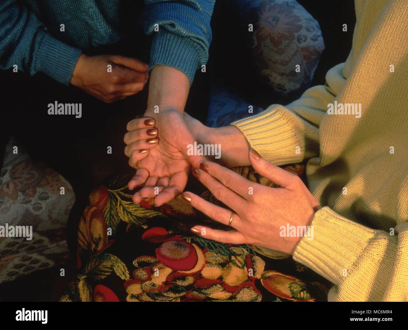 Massaging the hand of a patient Stock Photo - Alamy