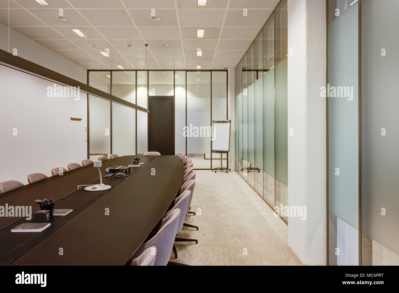 Empty boardroom with table and chairs Stock Photo - Alamy