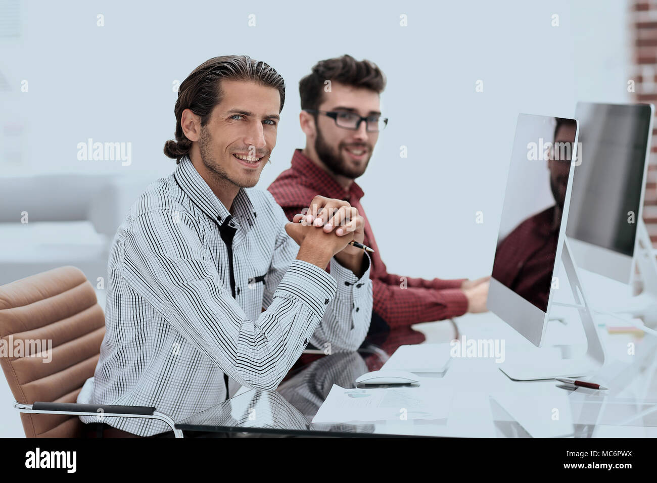 successful employees in the office Stock Photo - Alamy