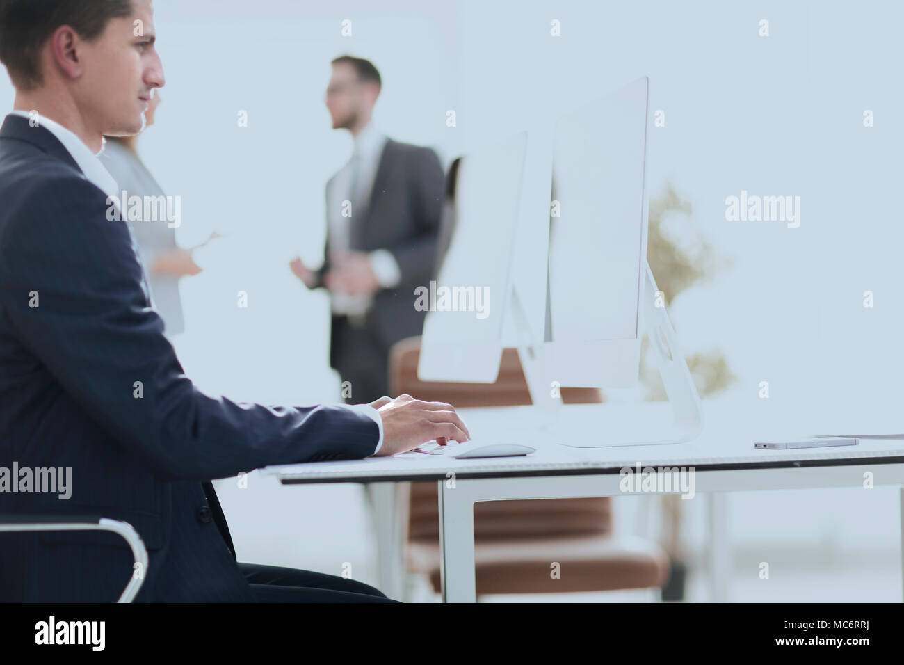 employee is typing on the computer keyboard Stock Photo - Alamy