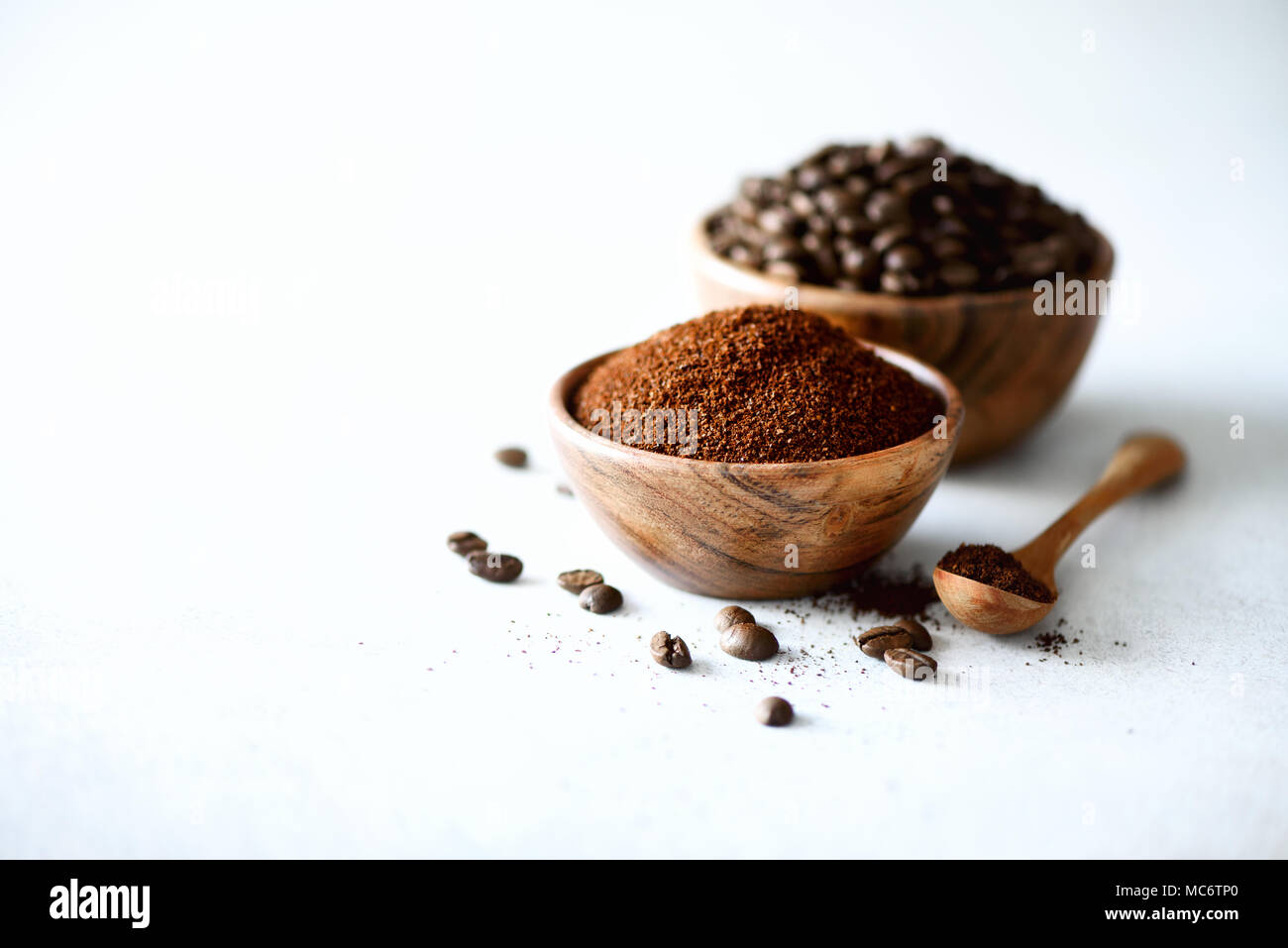 Ingredients for making caffeine drink - coffee beans, ground and ...