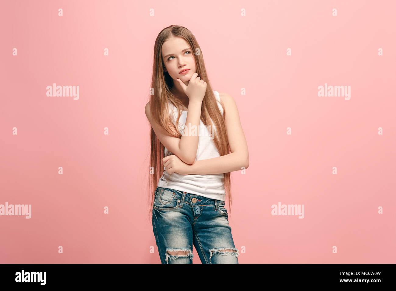 Young serious thoughtful teen girl. Doubt concept Stock Photo - Alamy
