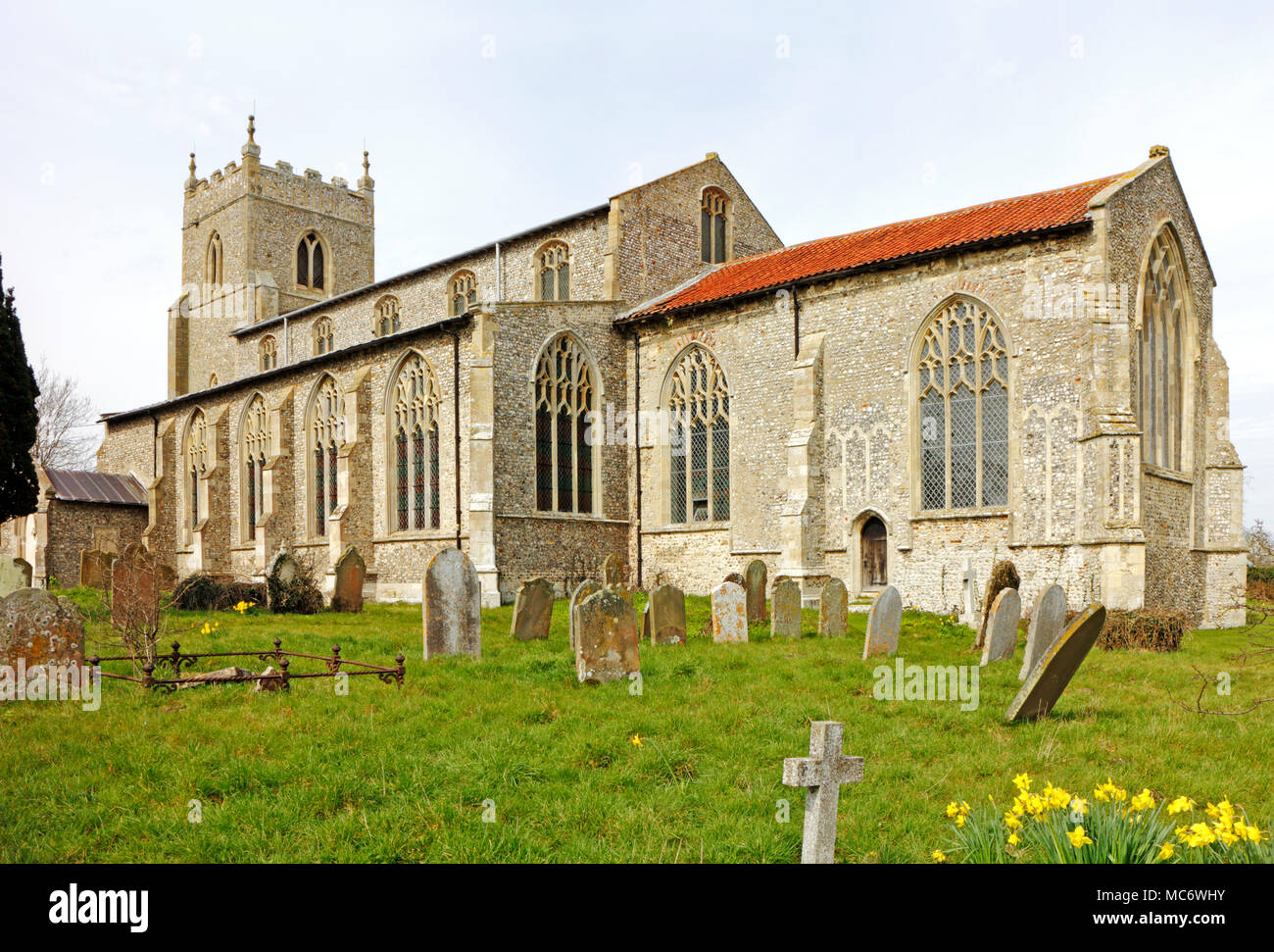 A view of the parish church of St Mary the Virgin in spring at Wiveton ...
