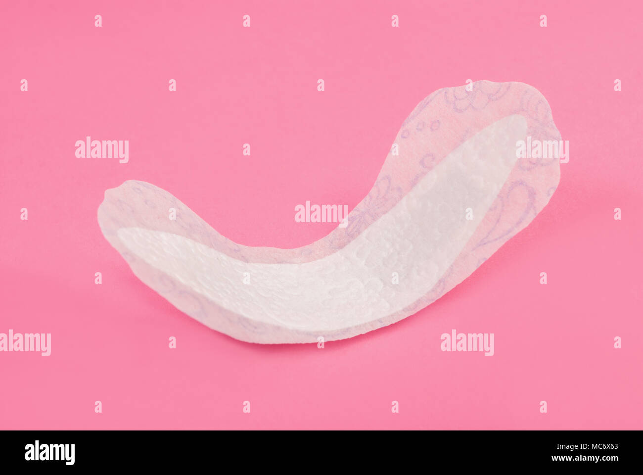 Woman daily pad hygiene protection isolated on pink background Stock ...
