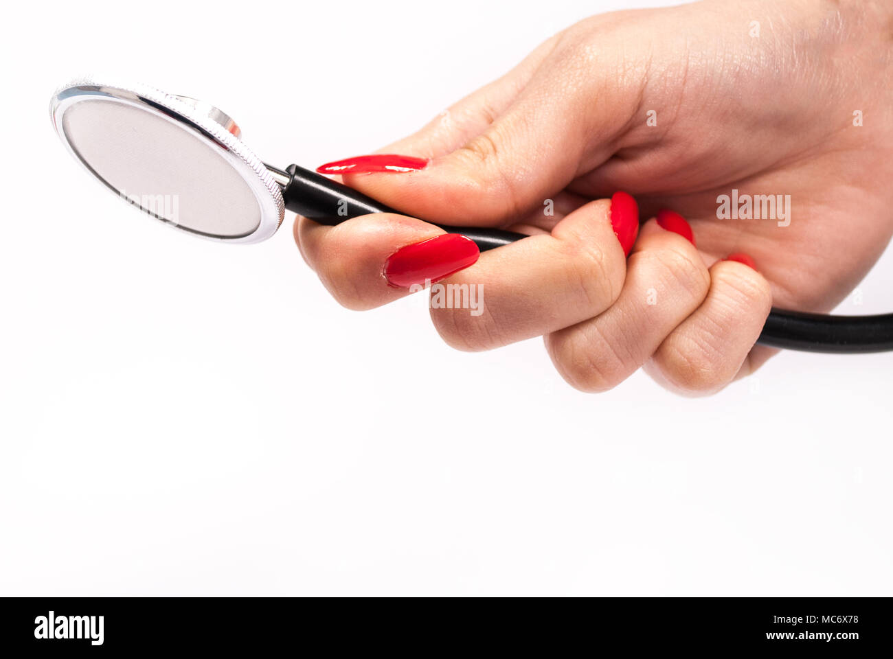 Woman holding stethoscope in hand isolated on white background Stock ...