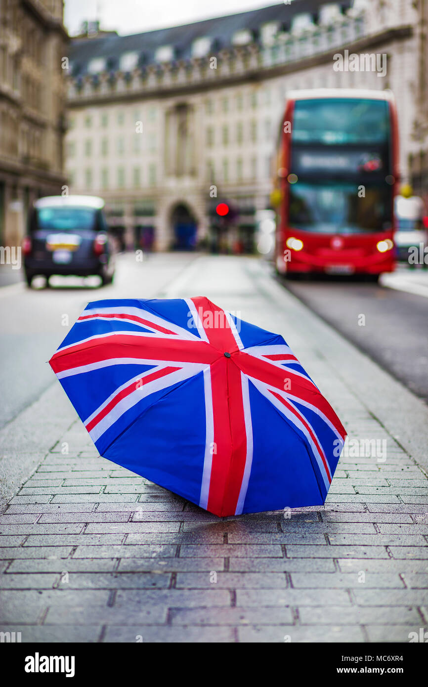 London, England - British umbrella at Regent Street with iconic red ...