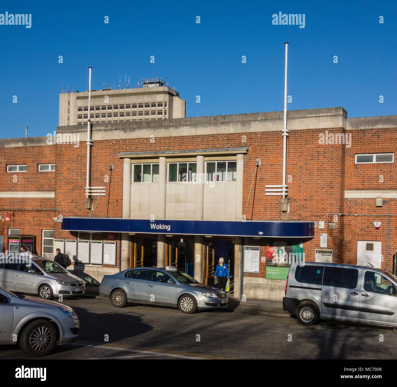 Woking Railway Station approach in Woking, Surrey, UK. A major stop on ...