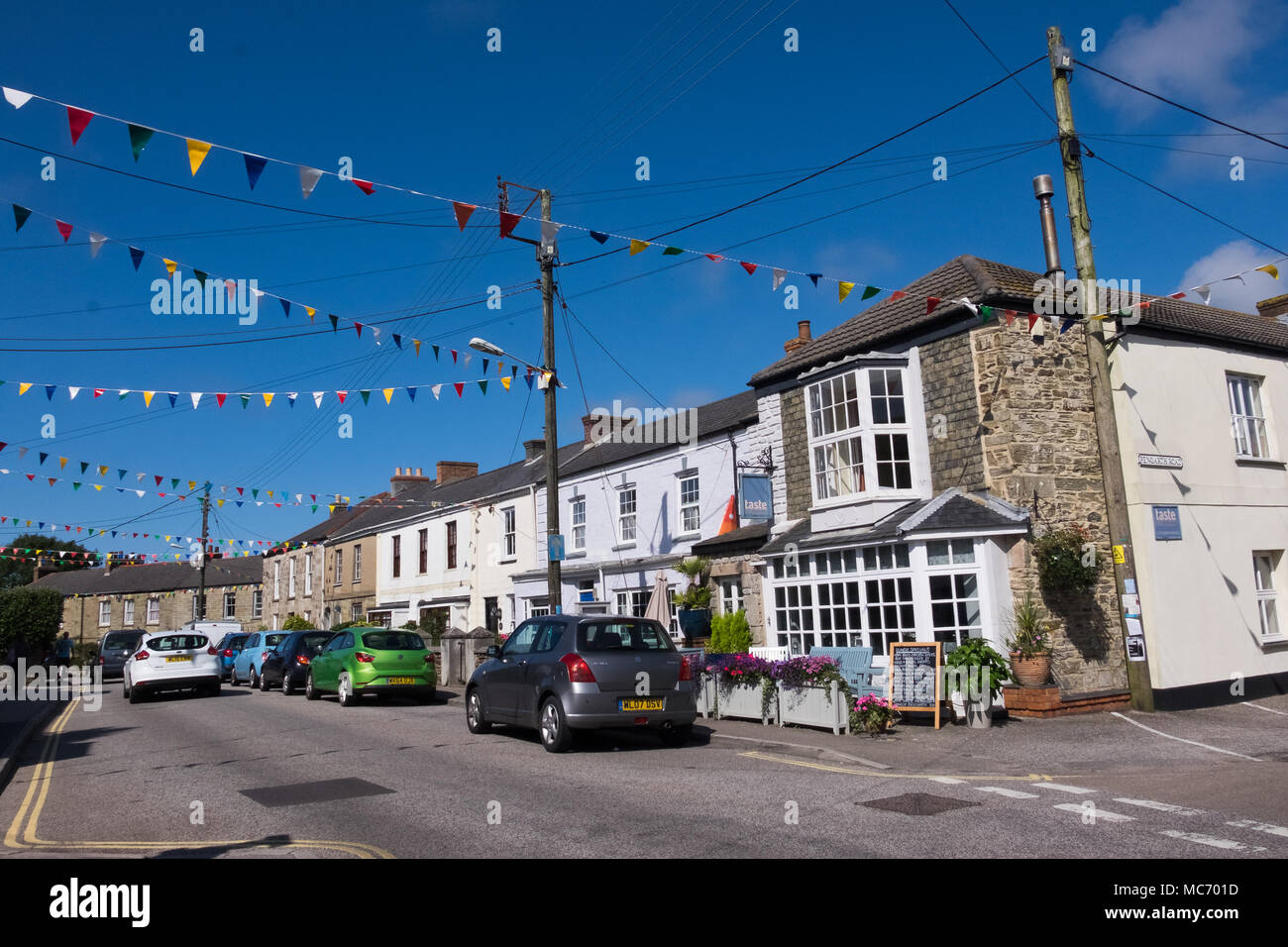 View down the main street of St. Agnes Village, Cornwall beneath a ...