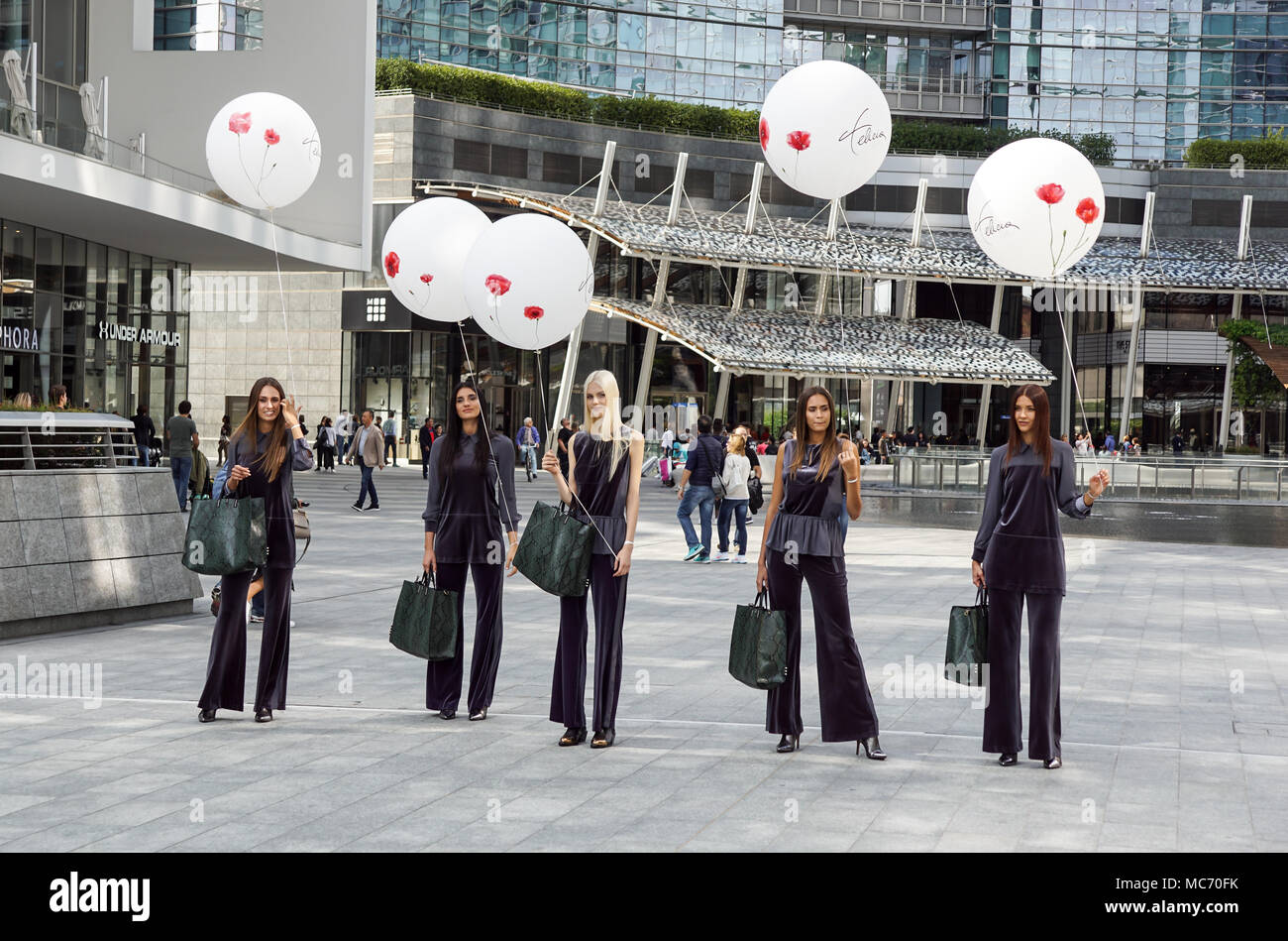 MILAN, ITALY - SEPTEMBER 22, 2017: Fashionable models poses on the ...