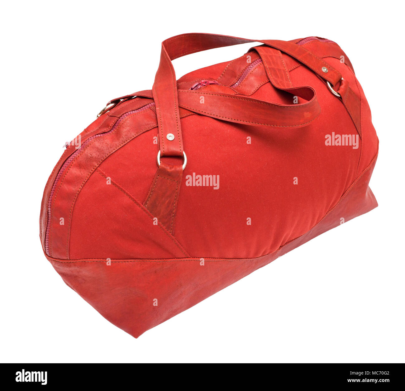 side view of red travelling bag isolated on white background Stock ...