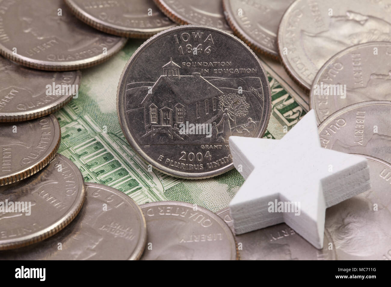 A quarter of Iowa, quarters of USA and white star. A circle of the US ...