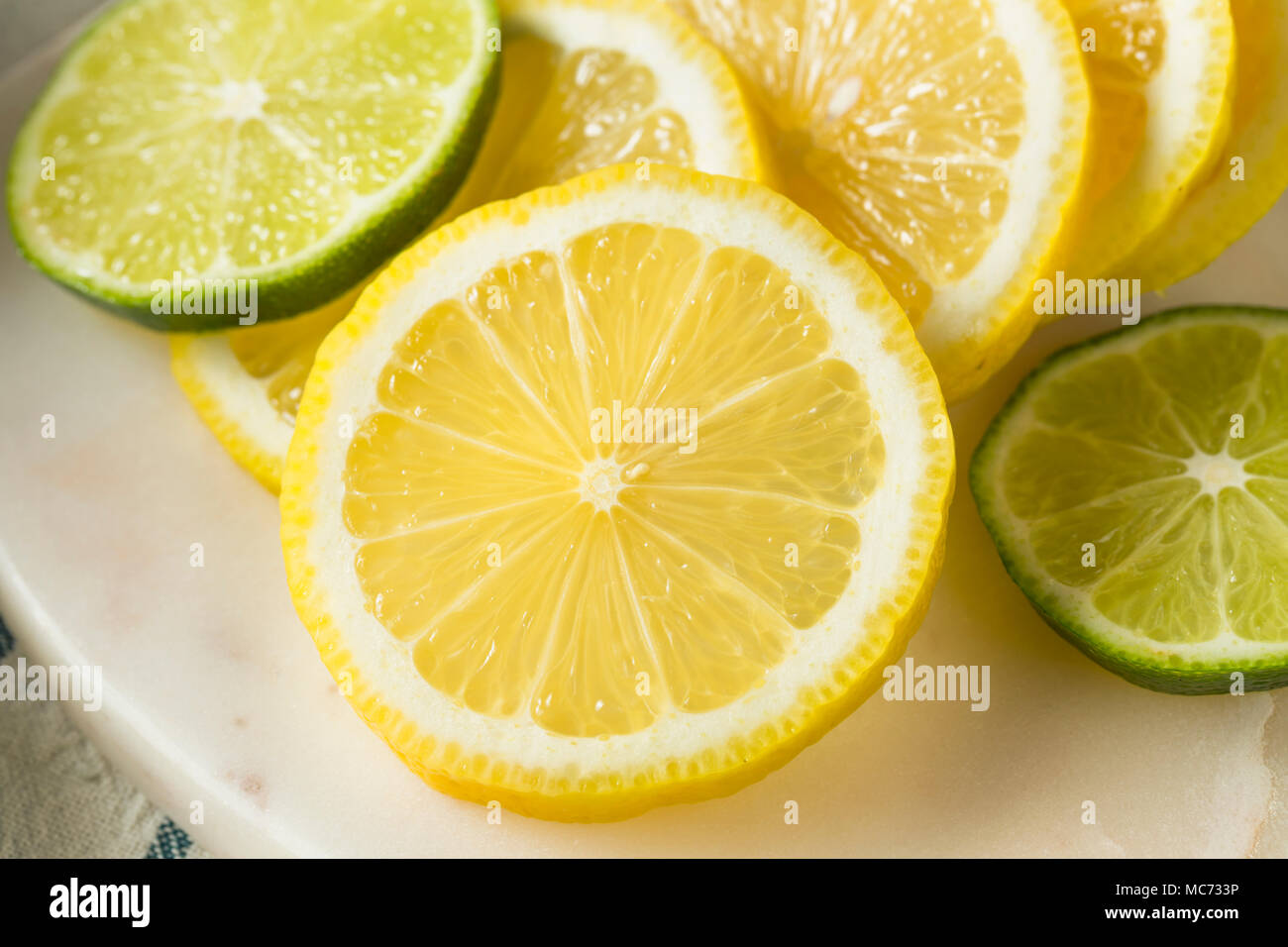 Raw Organic Lemons and LImes Ready to Use Stock Photo - Alamy