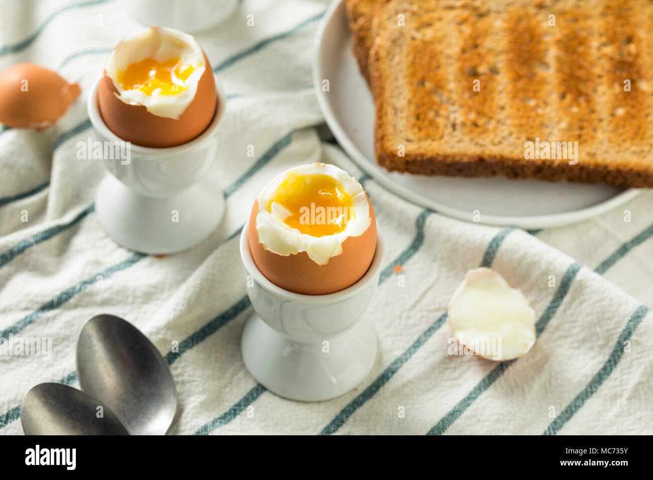 Homemade Soft Boiled Egg in a Cup with Toast Stock Photo - Alamy