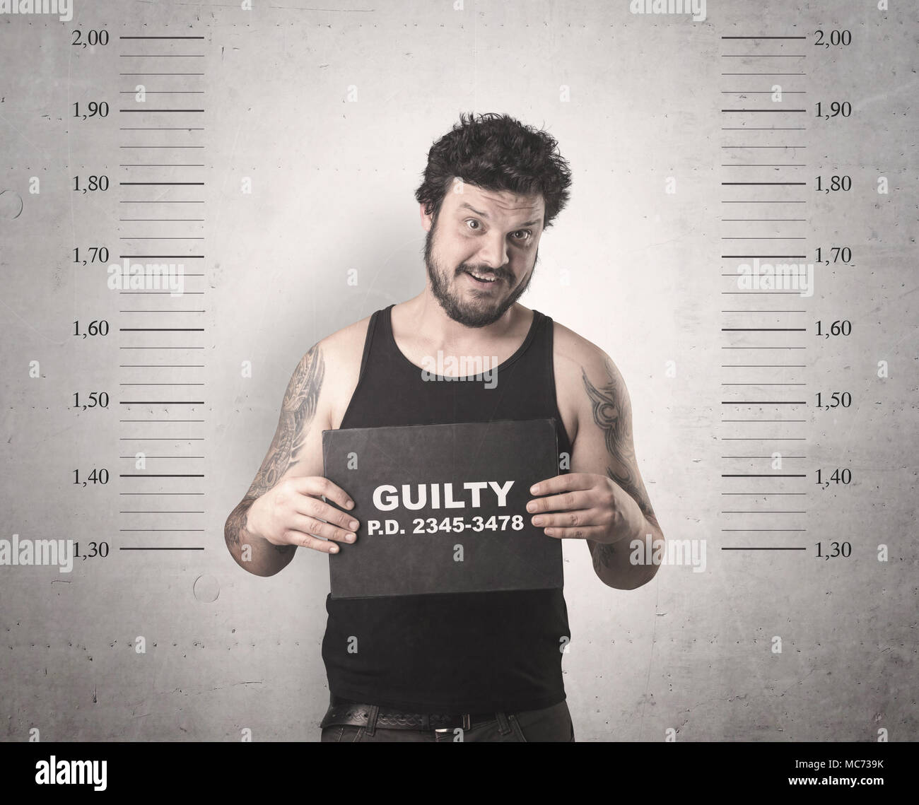 Caught guilty man with ID signs on his hand Stock Photo - Alamy