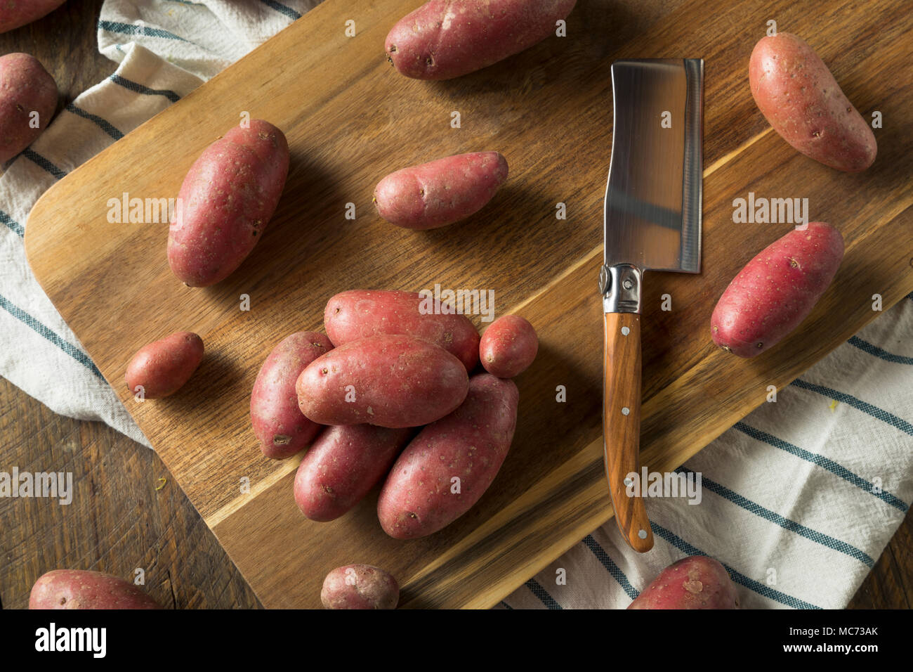 Raw Organic Red Fingerling Potatoes Ready to Cut Stock Photo - Alamy