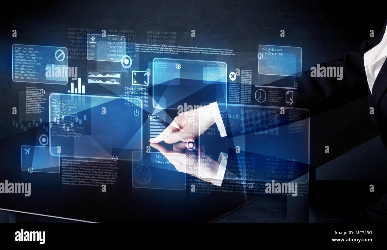 Man pressing technology smart table interface with blue graphs Stock ...