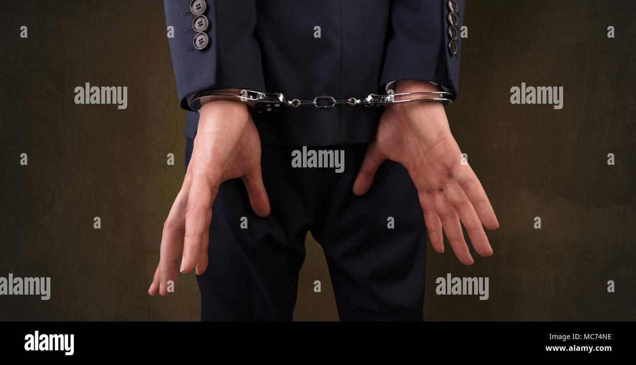 Close now arrested men hand with dark background and handcuffs Stock ...