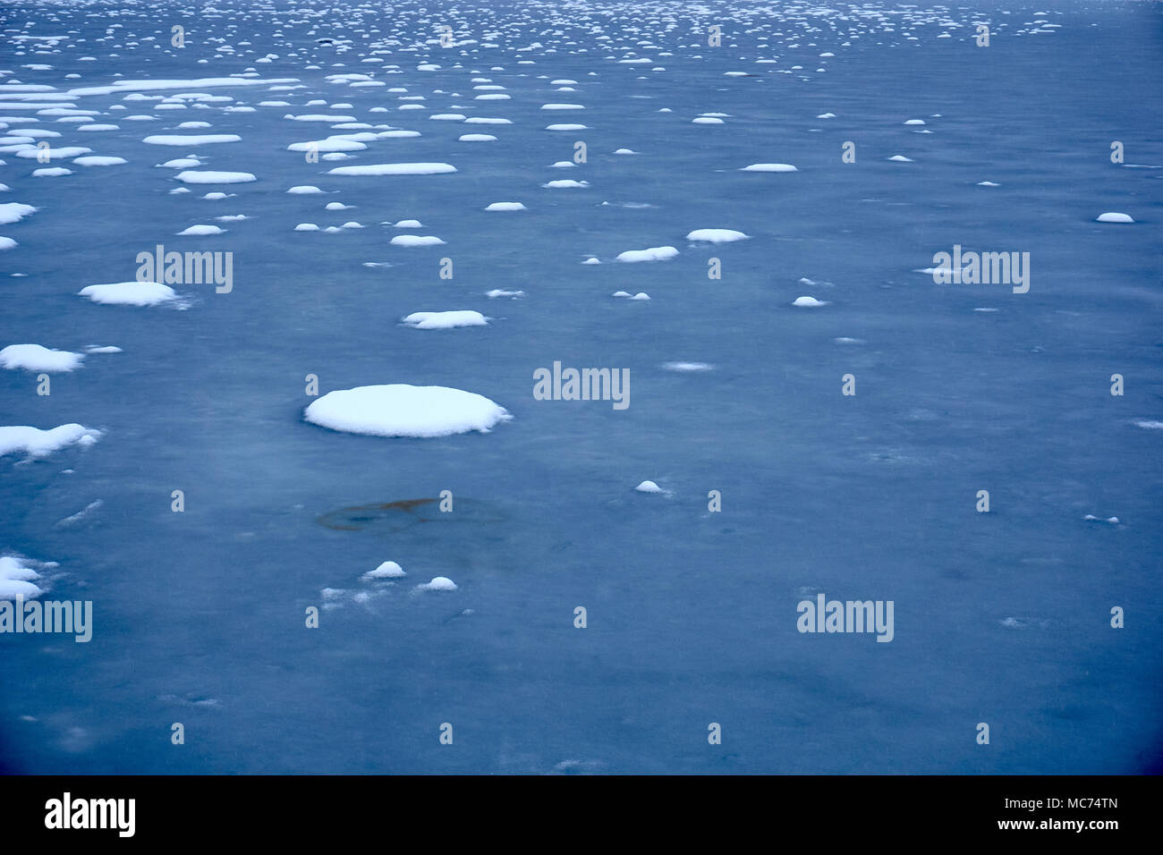 The frozen sea is beautiful clouds at sunset. Denmark. Baltic Sea ...