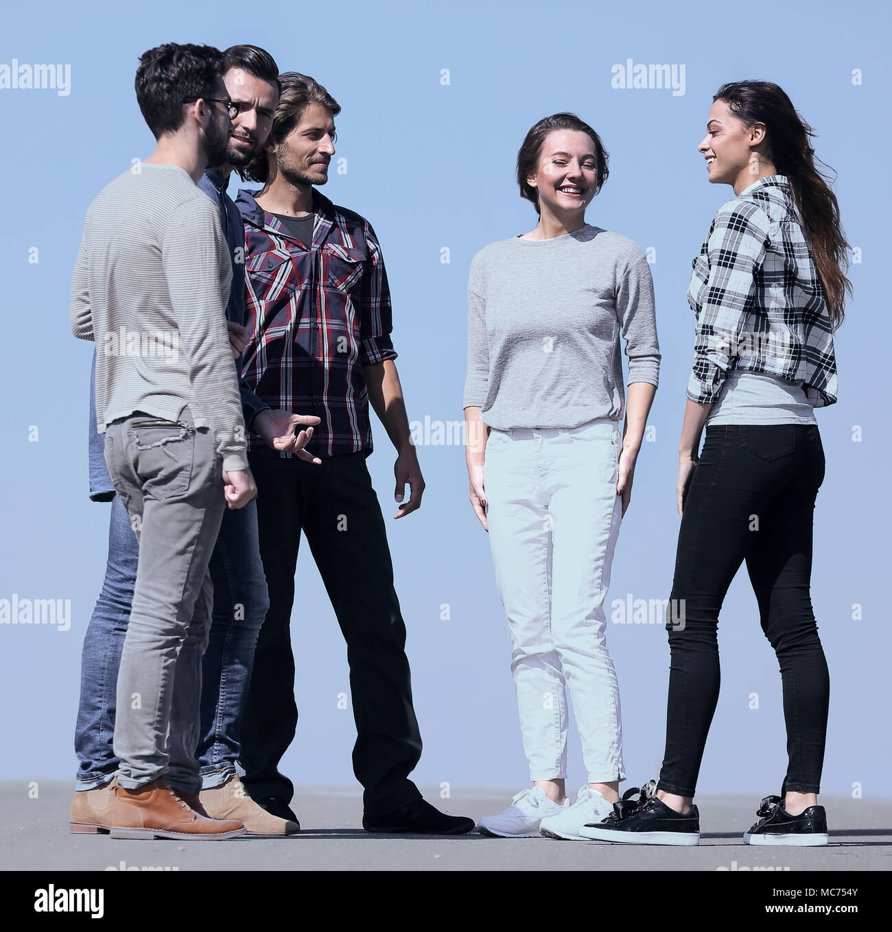 creative team of friends talking outdoors.the concept of teamwork Stock ...