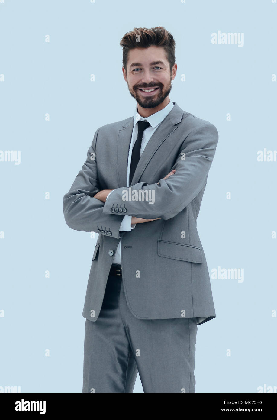 Confident successful businessman in gray suit on white backgroun Stock ...