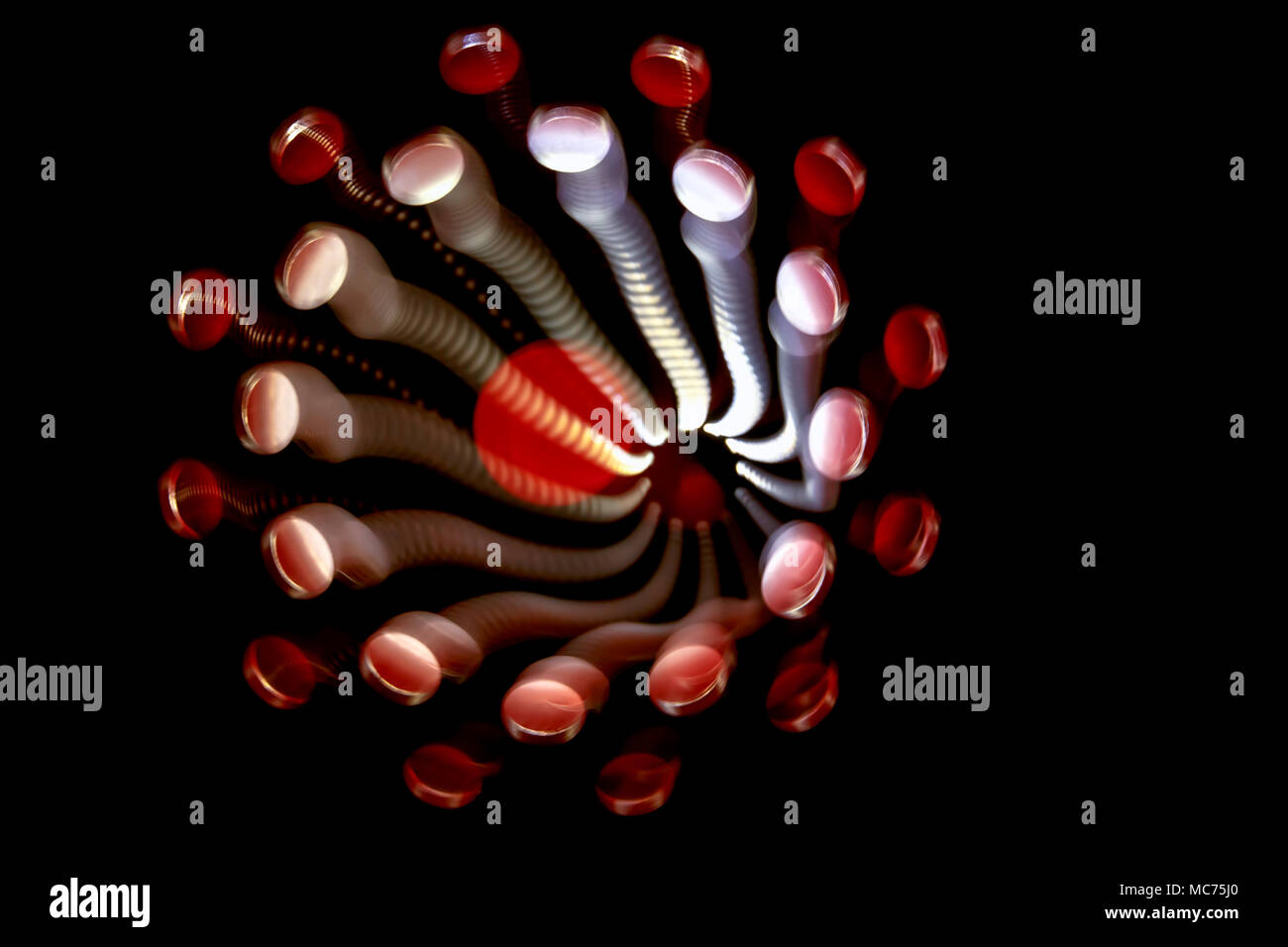 Sound waves in the visible red color in the dark Stock Photo - Alamy