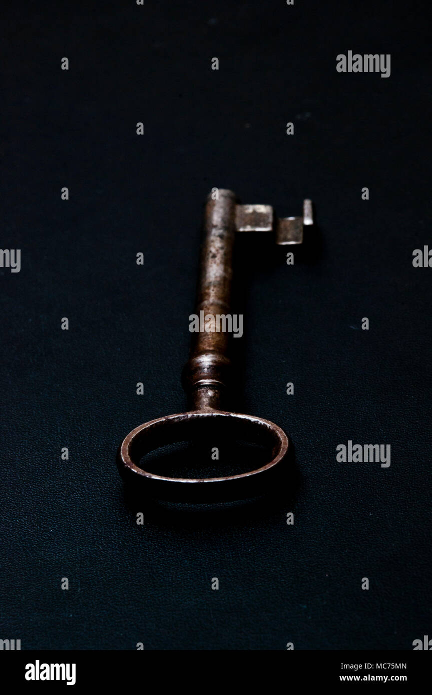 old bit key on a dark background, secrecy concept Stock Photo - Alamy