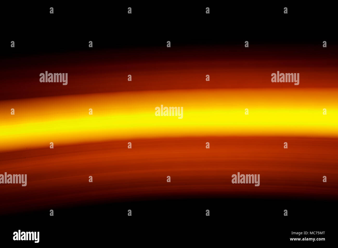 Abstract luminous orange background in the dark Stock Photo - Alamy