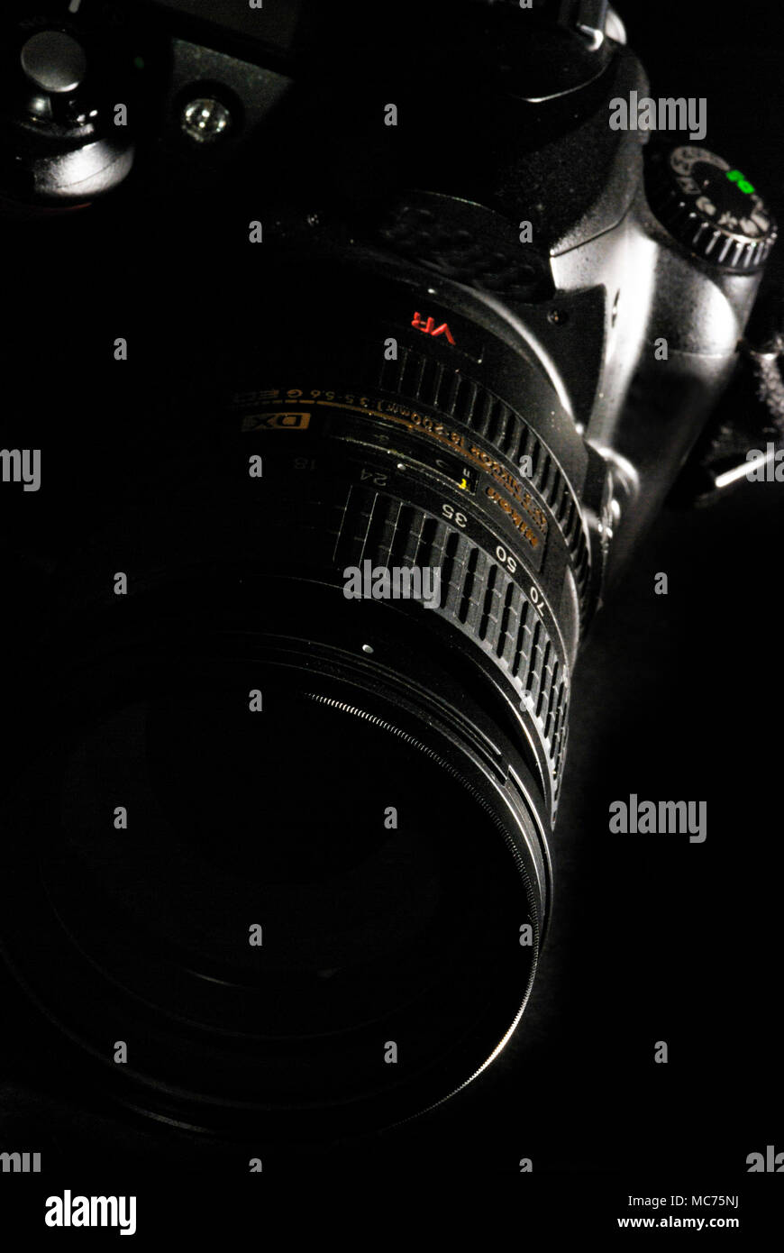 reflex photo camera in low-key light Stock Photo - Alamy