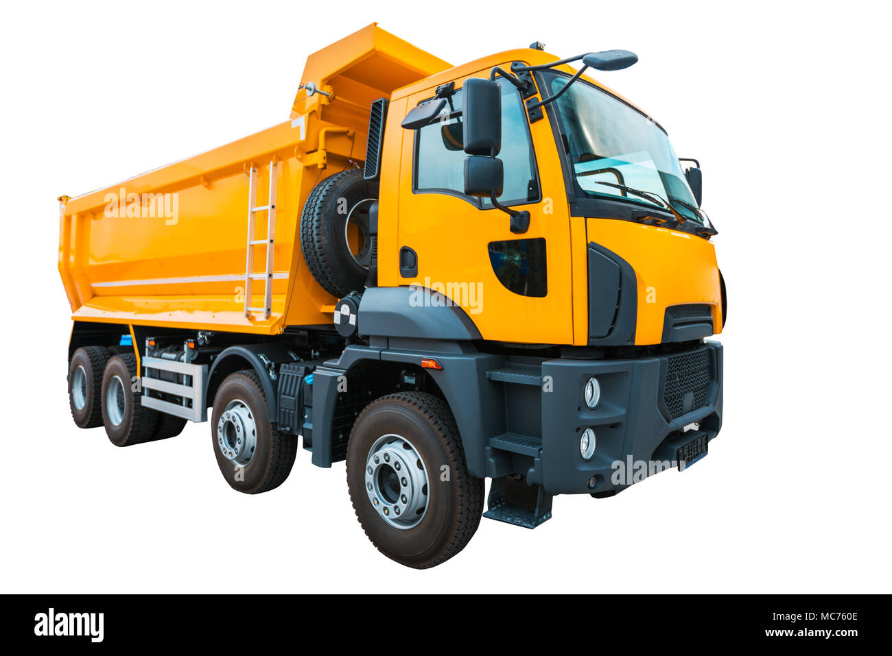 Yellow dump truck isolated on white background Stock Photo - Alamy
