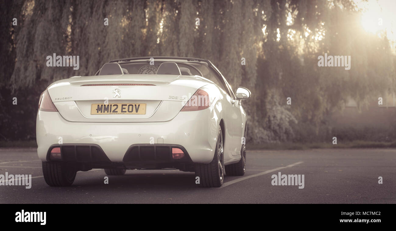 Rear view of a white Peugeot 308cc Roland Garros convertible sports car ...