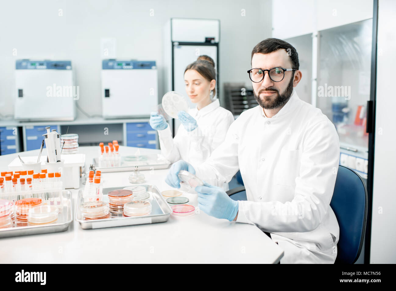 Portrait of a man in medical uniform during the bacteriological tests ...