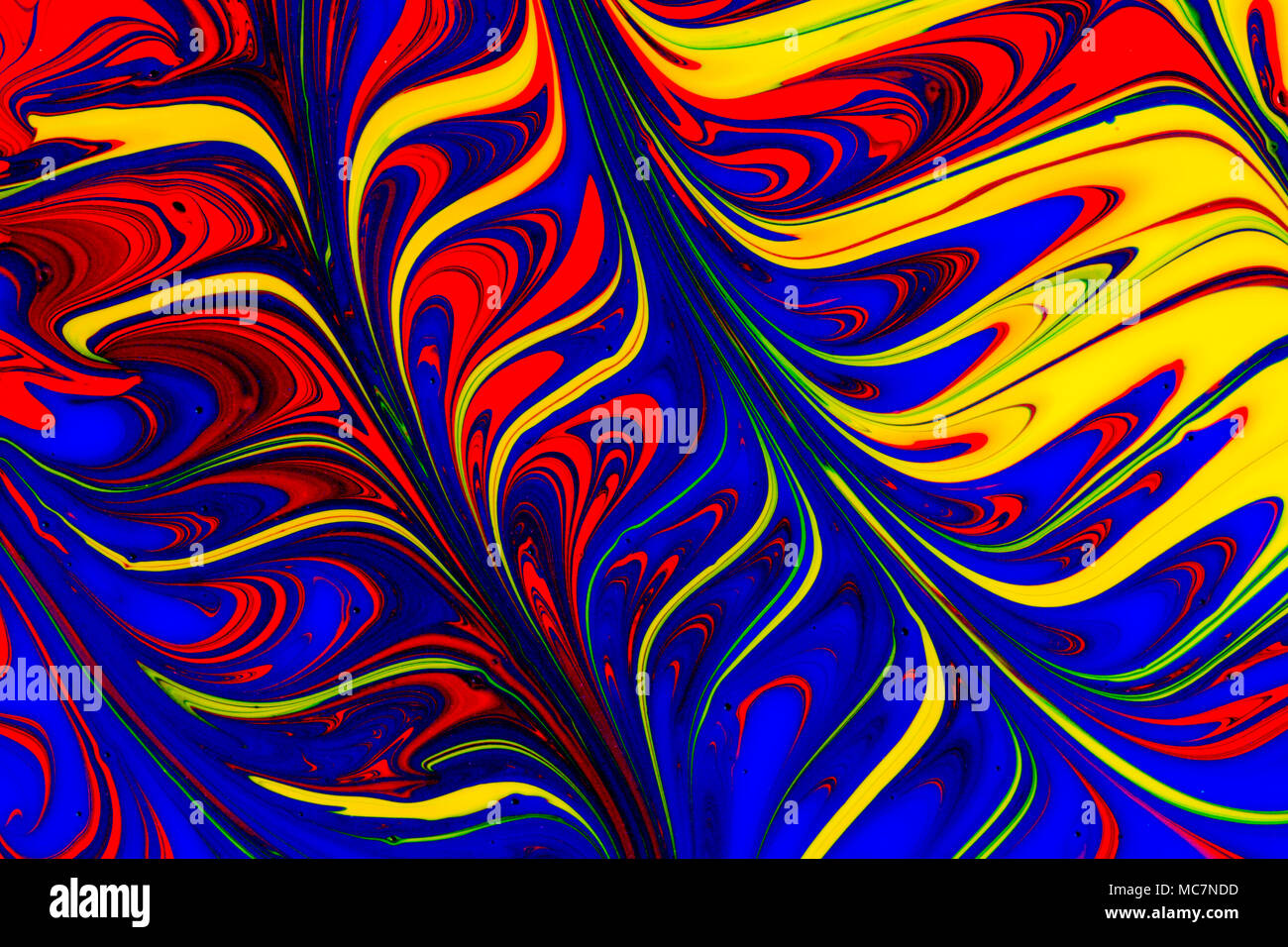 Abstract liquid paint swirl background design in blue, yellow and red ...