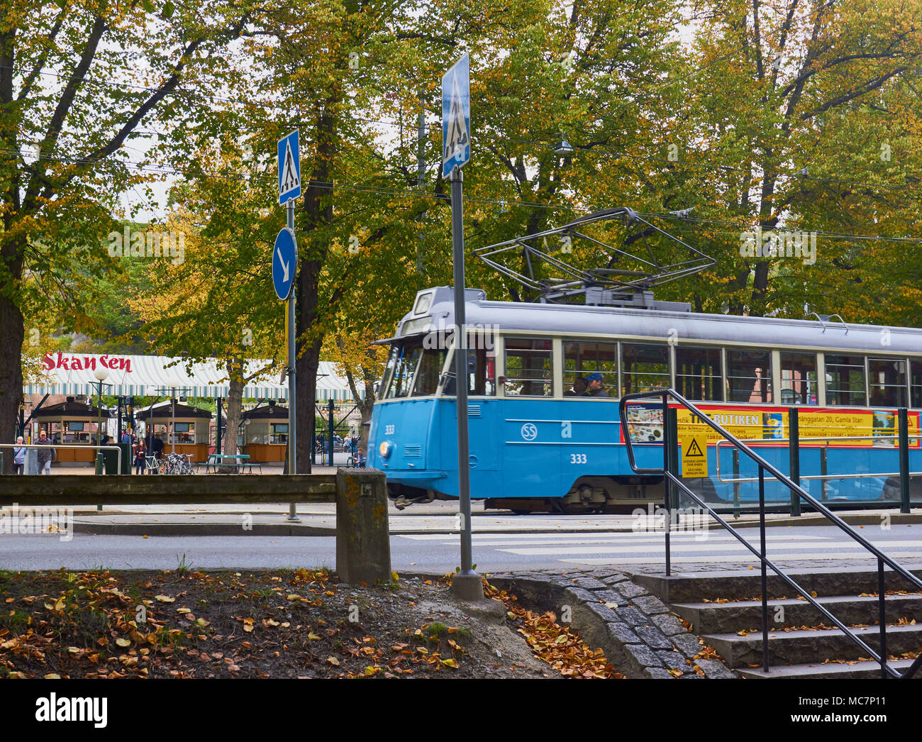 Tram passing Skansen, the World's first open-air museum, Djurgarden ...