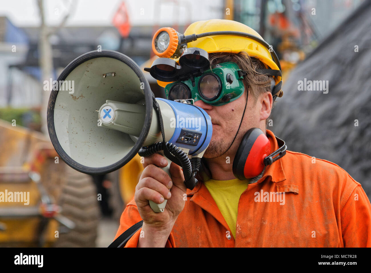 Pictured: An actors speaks to the crowd during The Man Engine show at ...