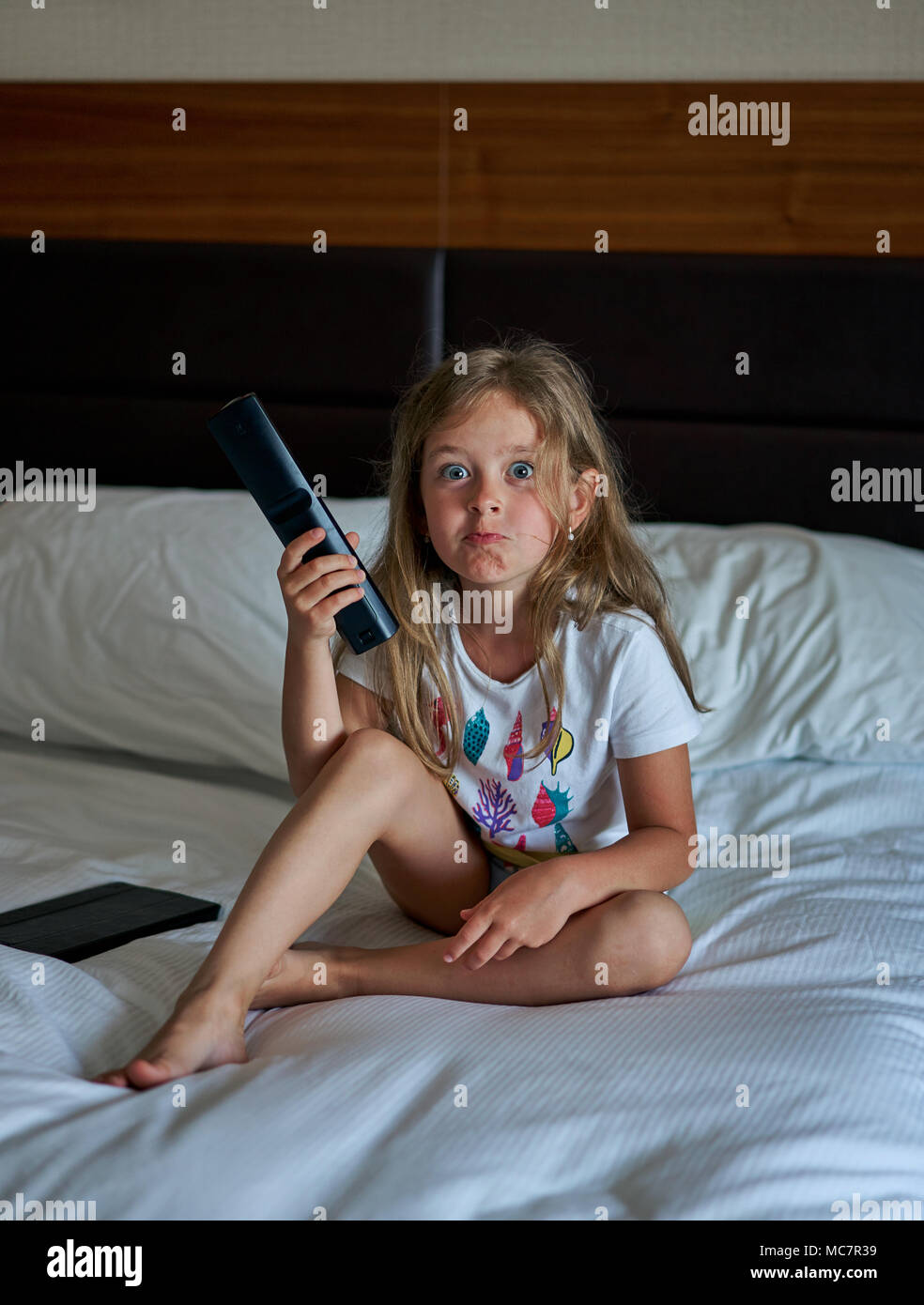 Small girl with remote control hi-res stock photography and images - Alamy